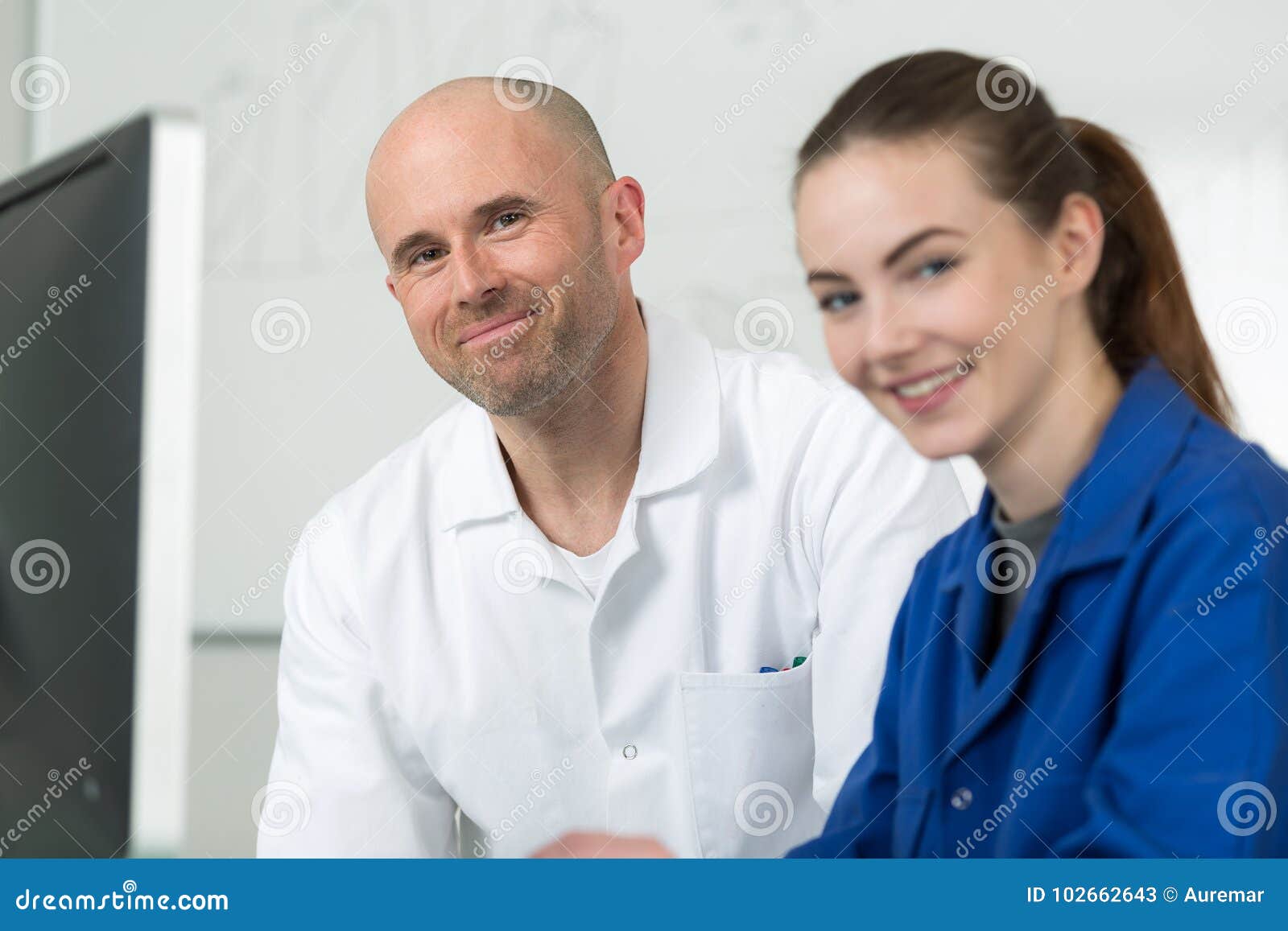 Portrait Confident Teacher in Computer Class Stock Image - Image of ...
