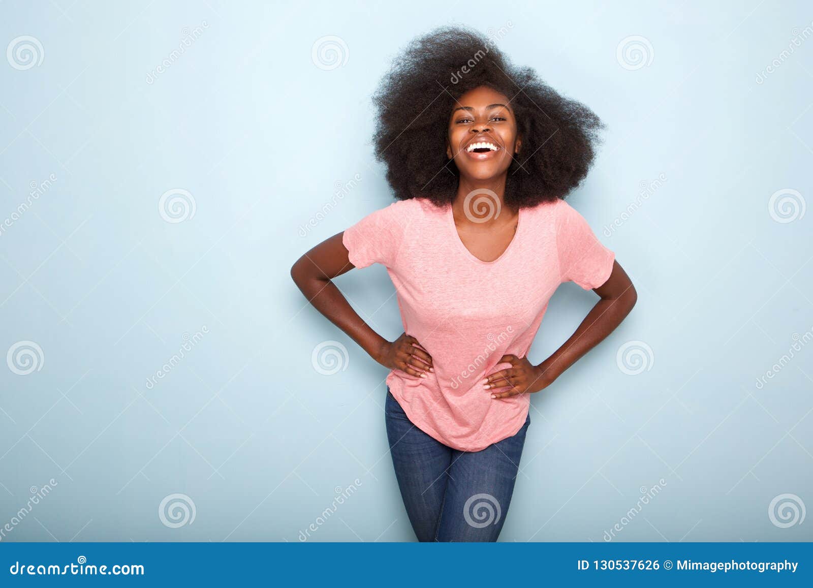 Confident Young Black Woman Smiling Wirth Hands on Hips Stock Photo ... Confident Young Black Woman Smiling Wirth Hands on Hips Stock Photo ...