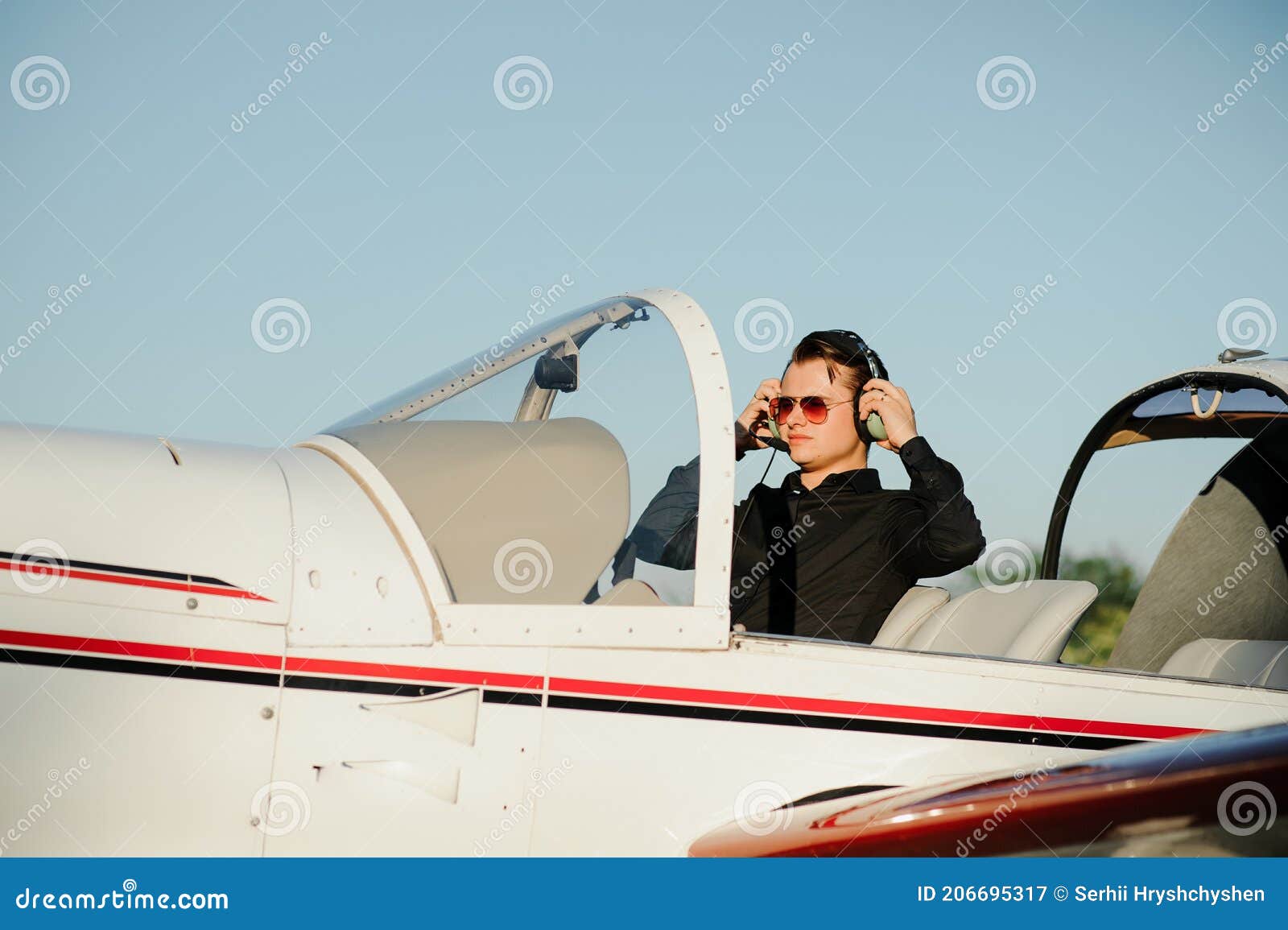 Portrait of Confident Young Man Pilot in Small Plane Stock Image ...