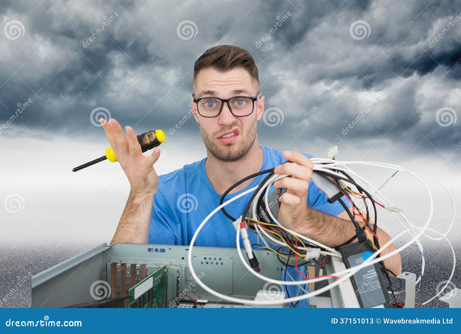 Portrait of Confused it Professional with Driver and Cables in Front of ...