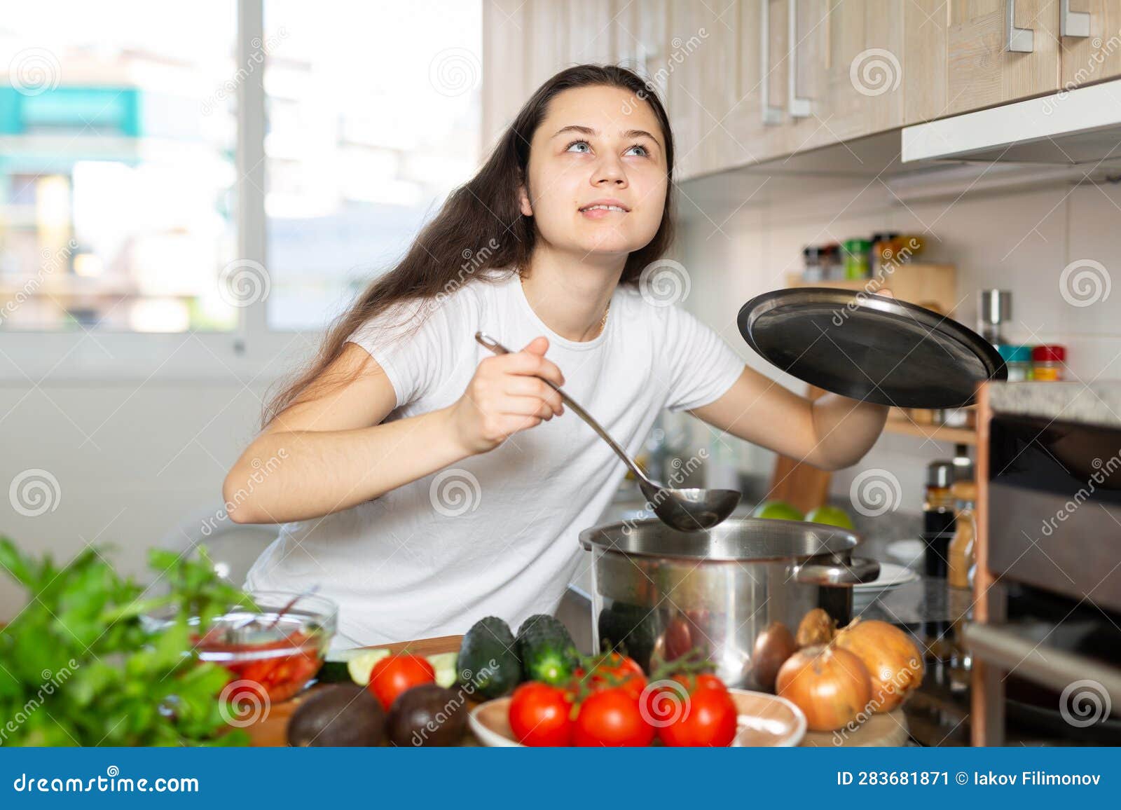 Portrait of Confused Young Woman at Kitchen Stock Image - Image of ...