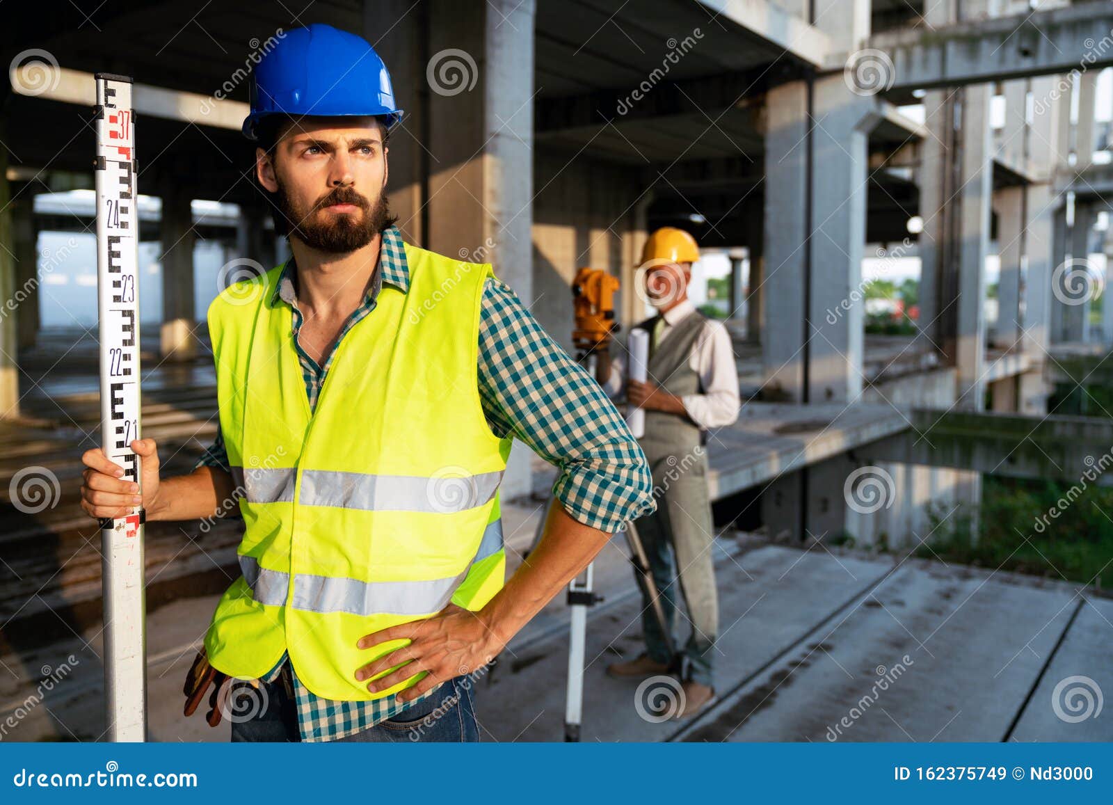 Portrait of Construction Architects, Engineers Working on Building Site ...