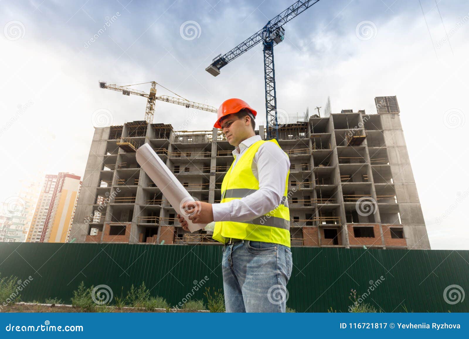 Portrait of Male Construction Engineer Standing on Building Site and ...