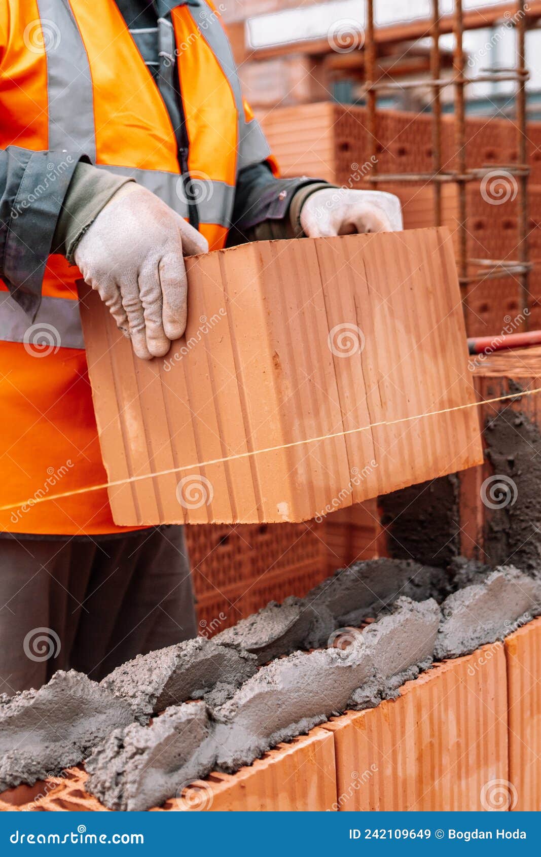 Portrait of Construction Worker Bricklayer Using Bricks and Mortar for ...