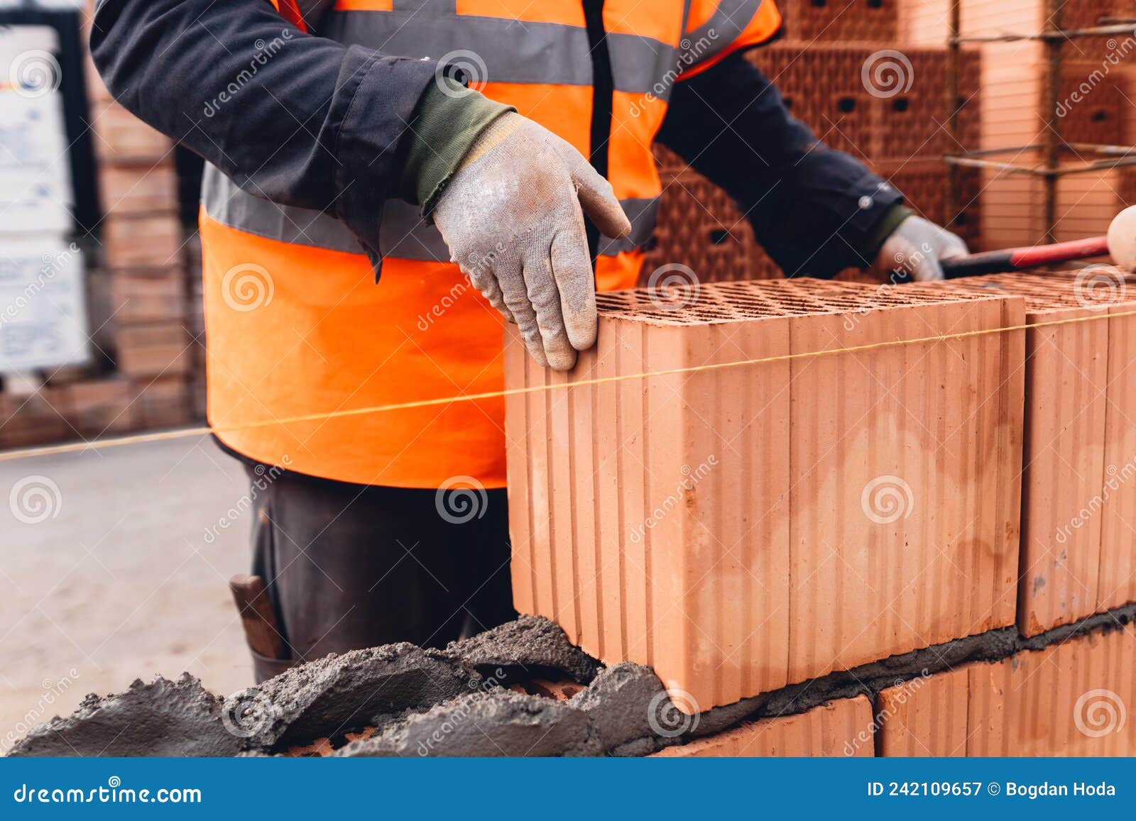 Portrait of Construction Worker Bricklayer Using Bricks and Mortar for ...