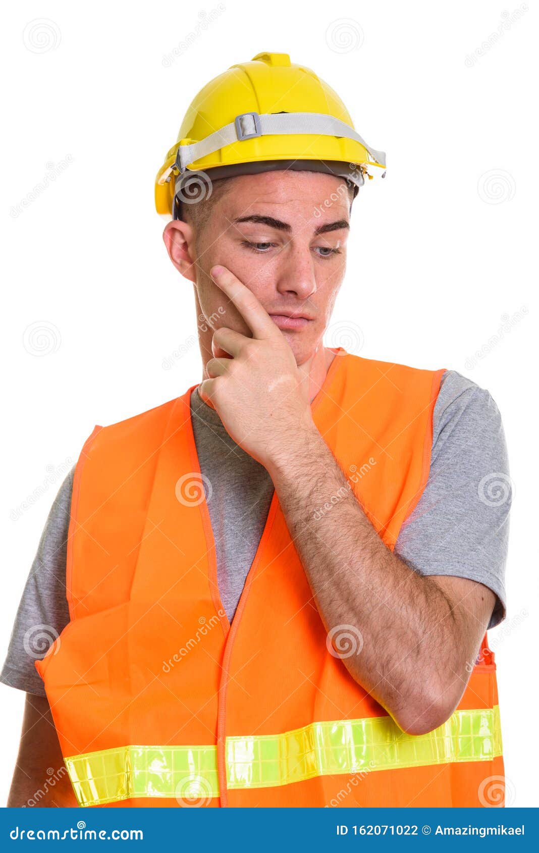 Construction Worker Thinking and Planning while Looking Down Stock ...