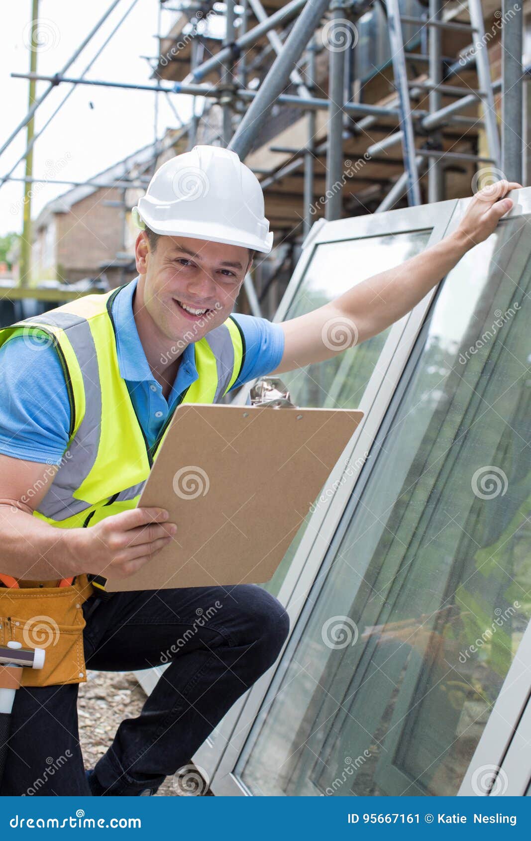 Portrait of Construction Worker Preparing To Fit New Windows Stock ...