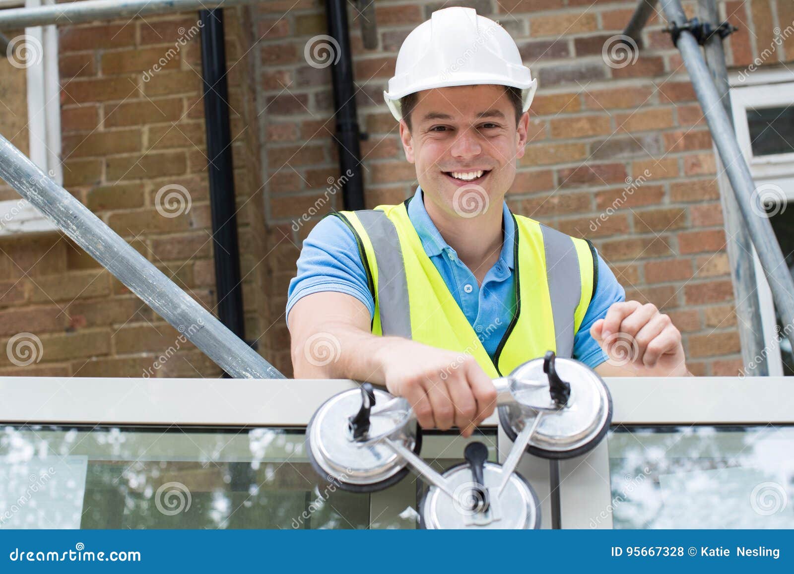 Portrait of Construction Worker Preparing To Fit New Windows Stock ...