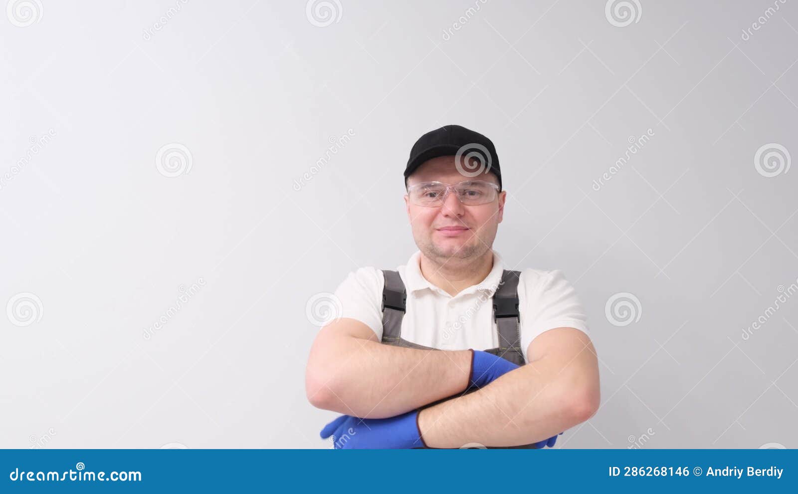 Portrait of a Construction Worker in the Studio on a White Background ...