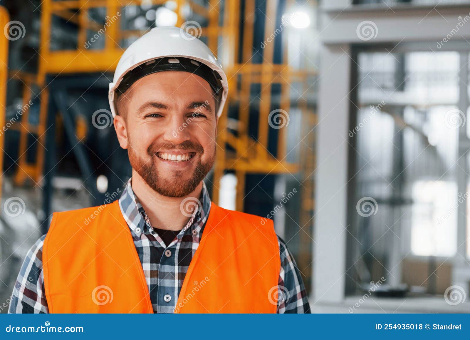 Portrait of Construction Worker in Uniform is in the Factory Stock ...