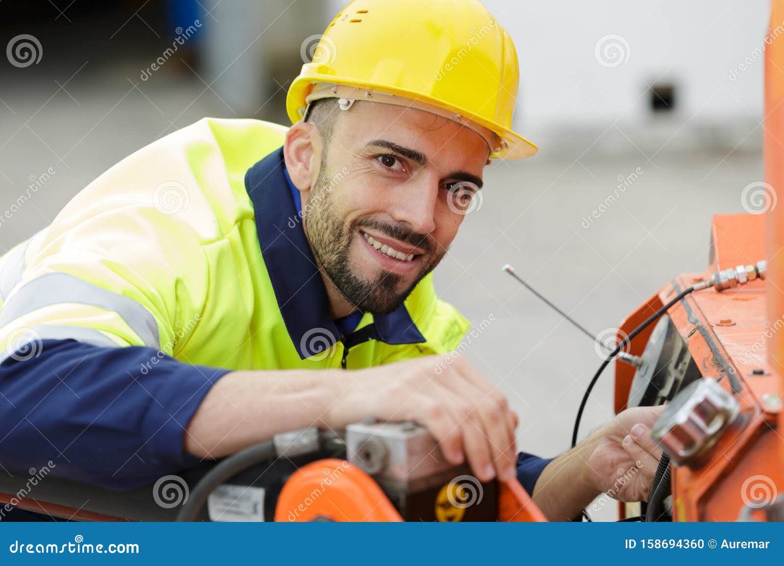 Portrait Construction Worker Using Machinery on Site Stock Photo ...