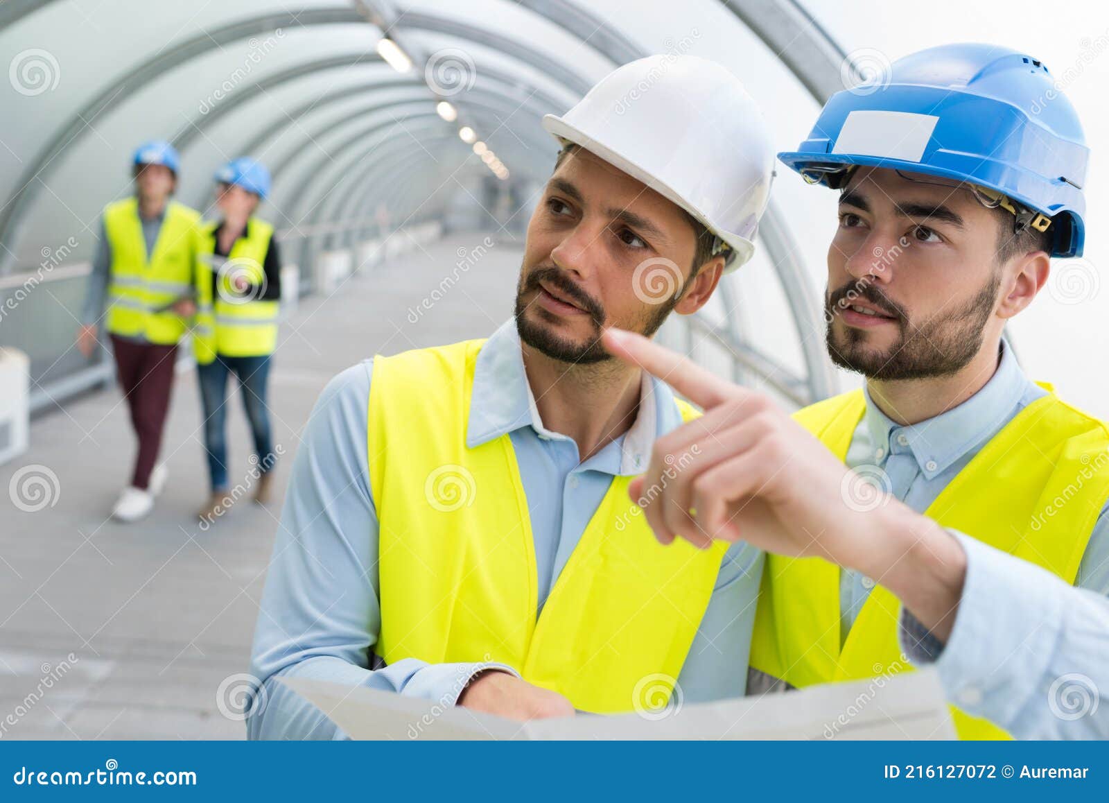 Portrait Contractors Pointing at Something Stock Photo - Image of ...