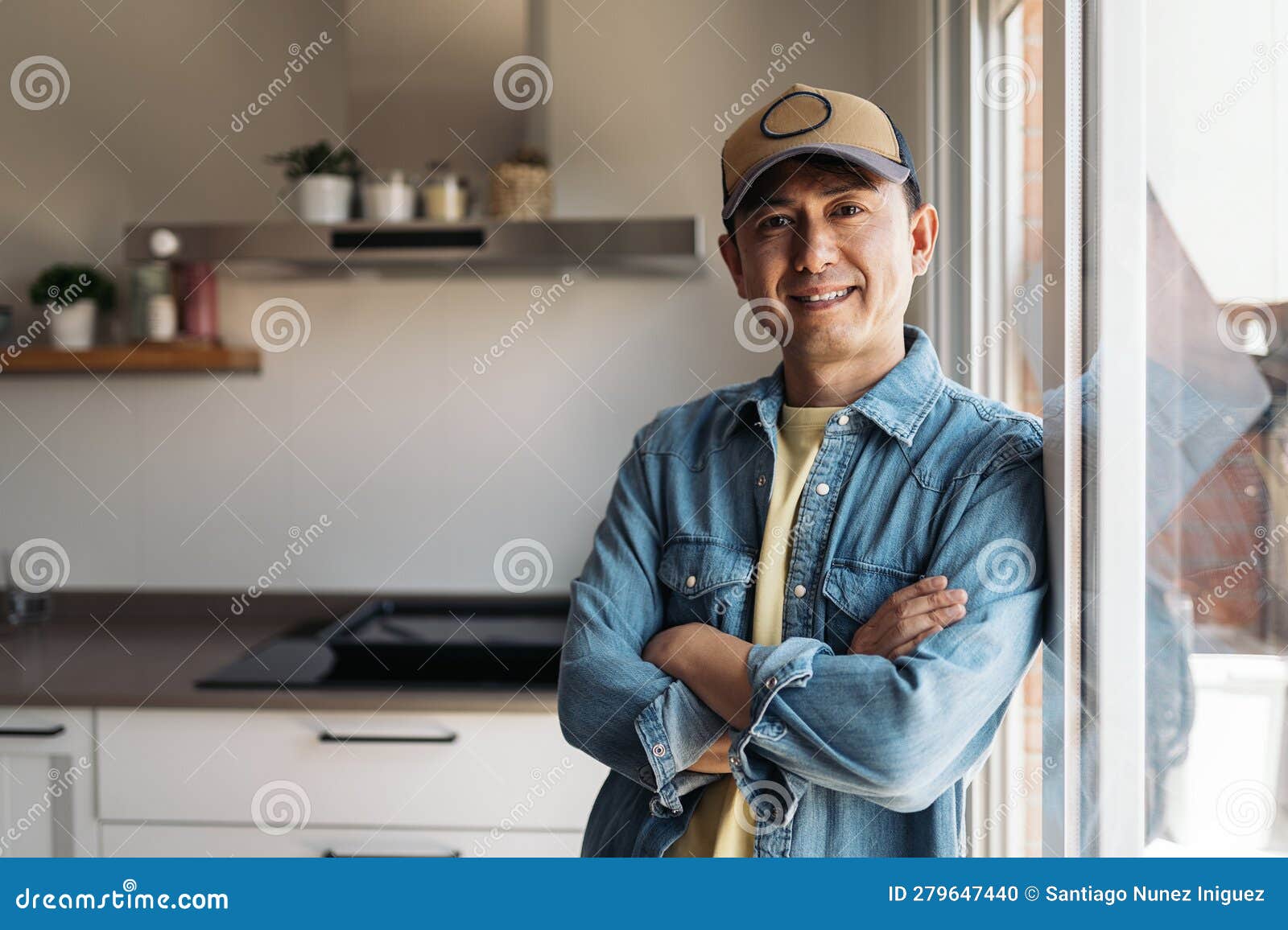 Friendly Asian Man Standing Looking at Camera at Home Stock Photo ...