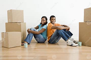 Portrait of Couple with Boxes. Stock Photo - Image of color, copy: 6152082