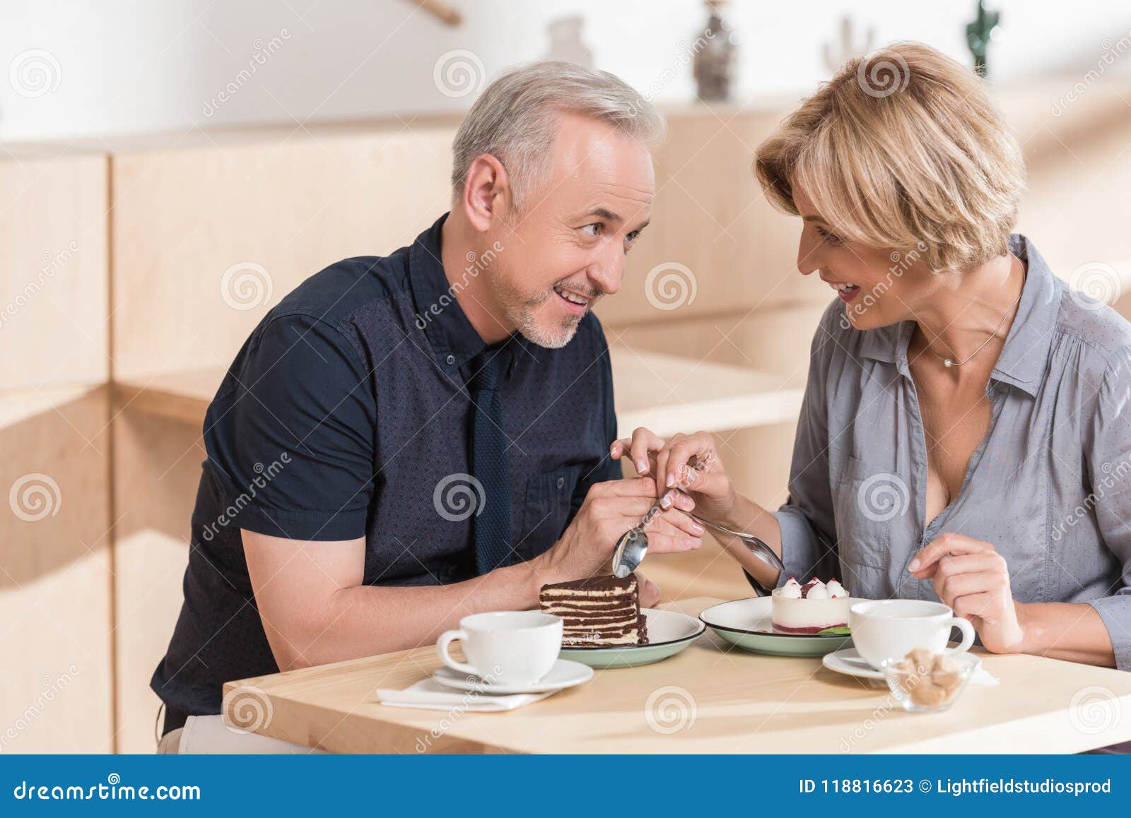 Portrait of Couple Eating Sweets Stock Image - Image of couple ...