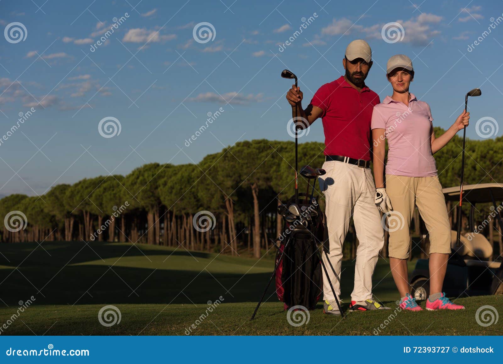 Portrait of Couple on Golf Course Stock Image - Image of lifestyle ...