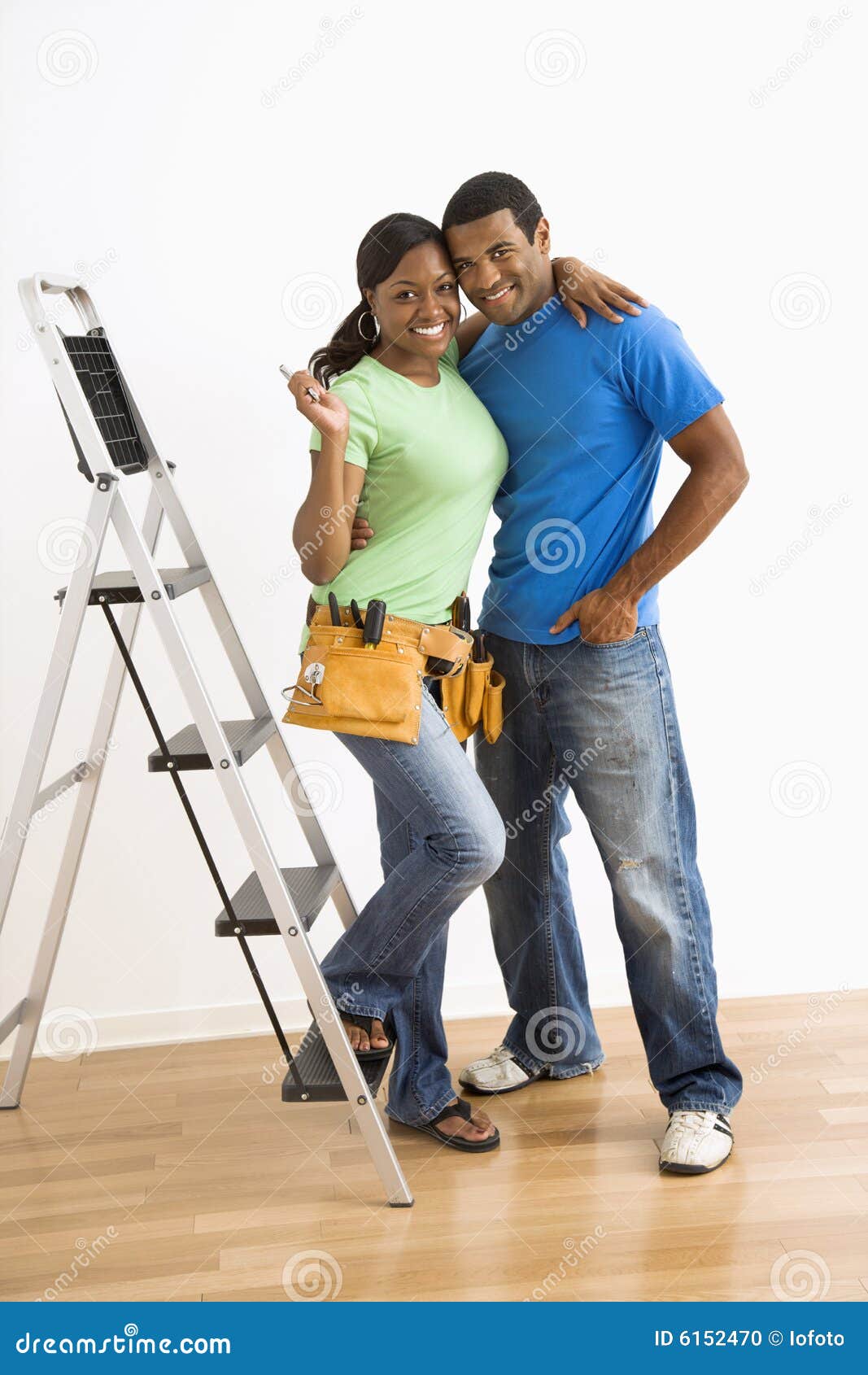 Portrait of Couple with Ladder. Stock Photo - Image of ladder, standing ...