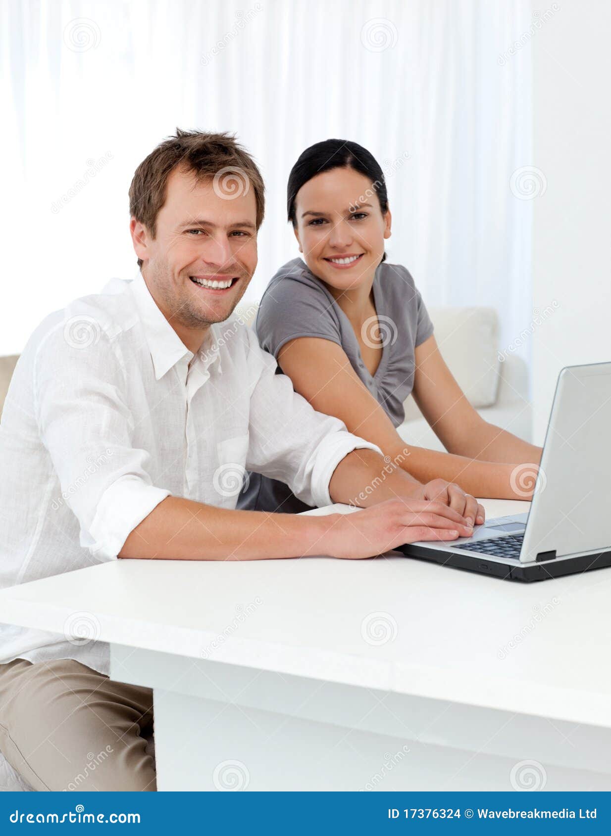 Portrait Couple with a Laptop at a Table Stock Photo - Image of search ...