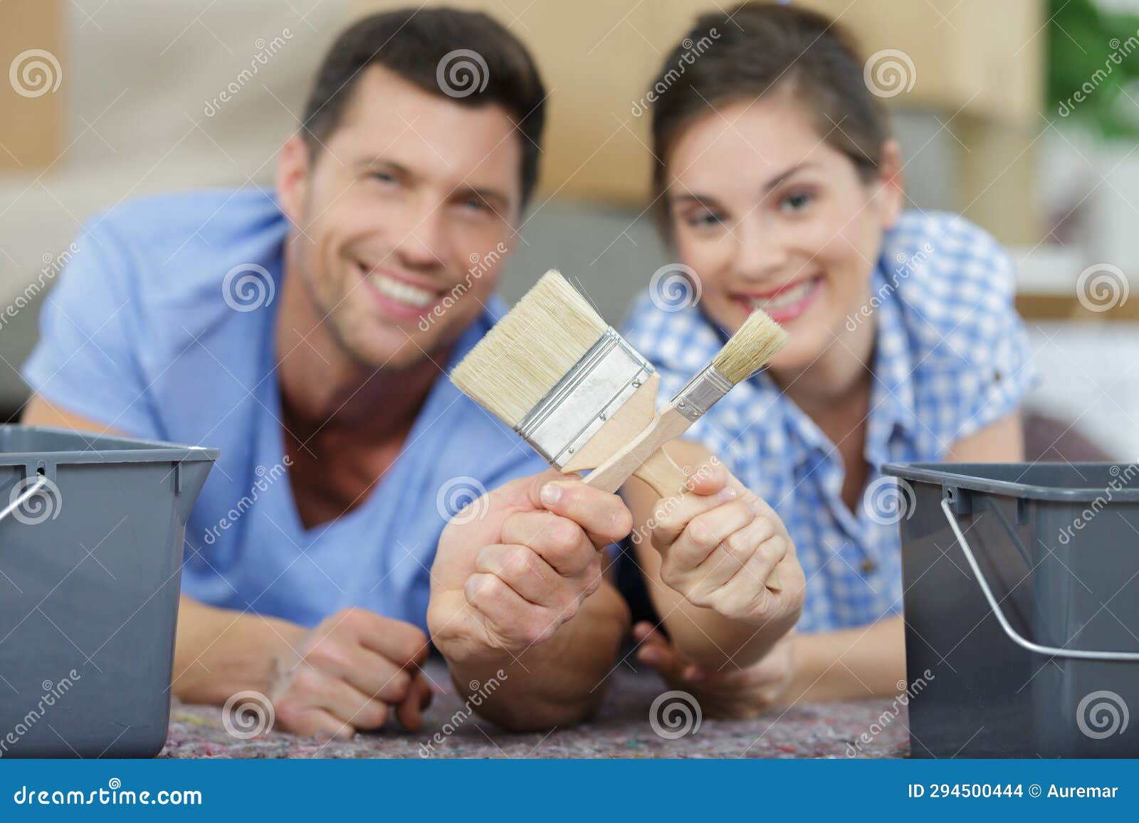 Portrait Couple Showing Painting Tools Stock Photo - Image of together ...