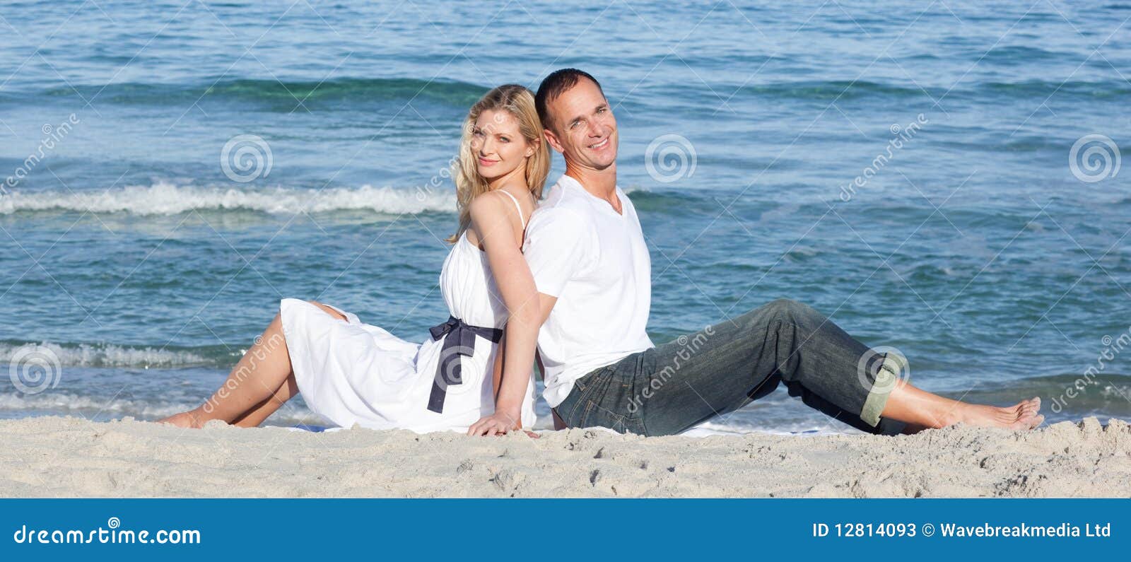 Portrait of Couple Sitting on Sand Stock Image - Image of love, girl ...
