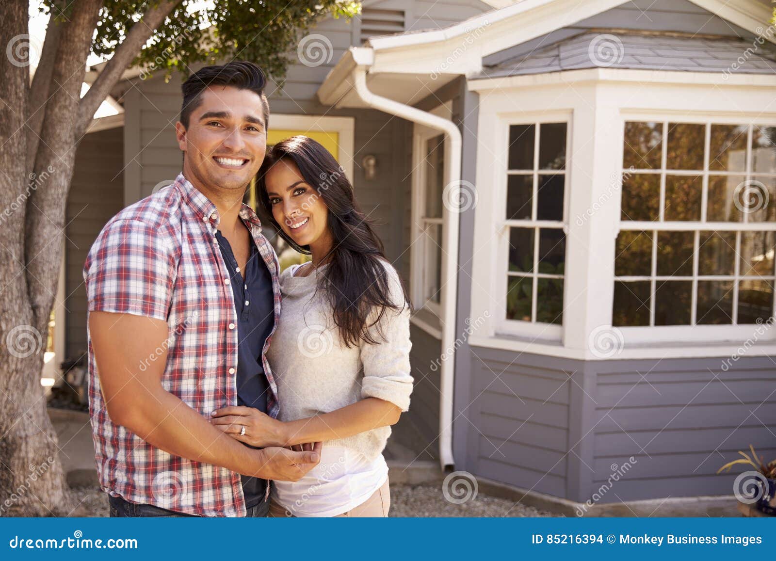Portrait of Couple Standing Outside Home Stock Photo - Image of summer ...