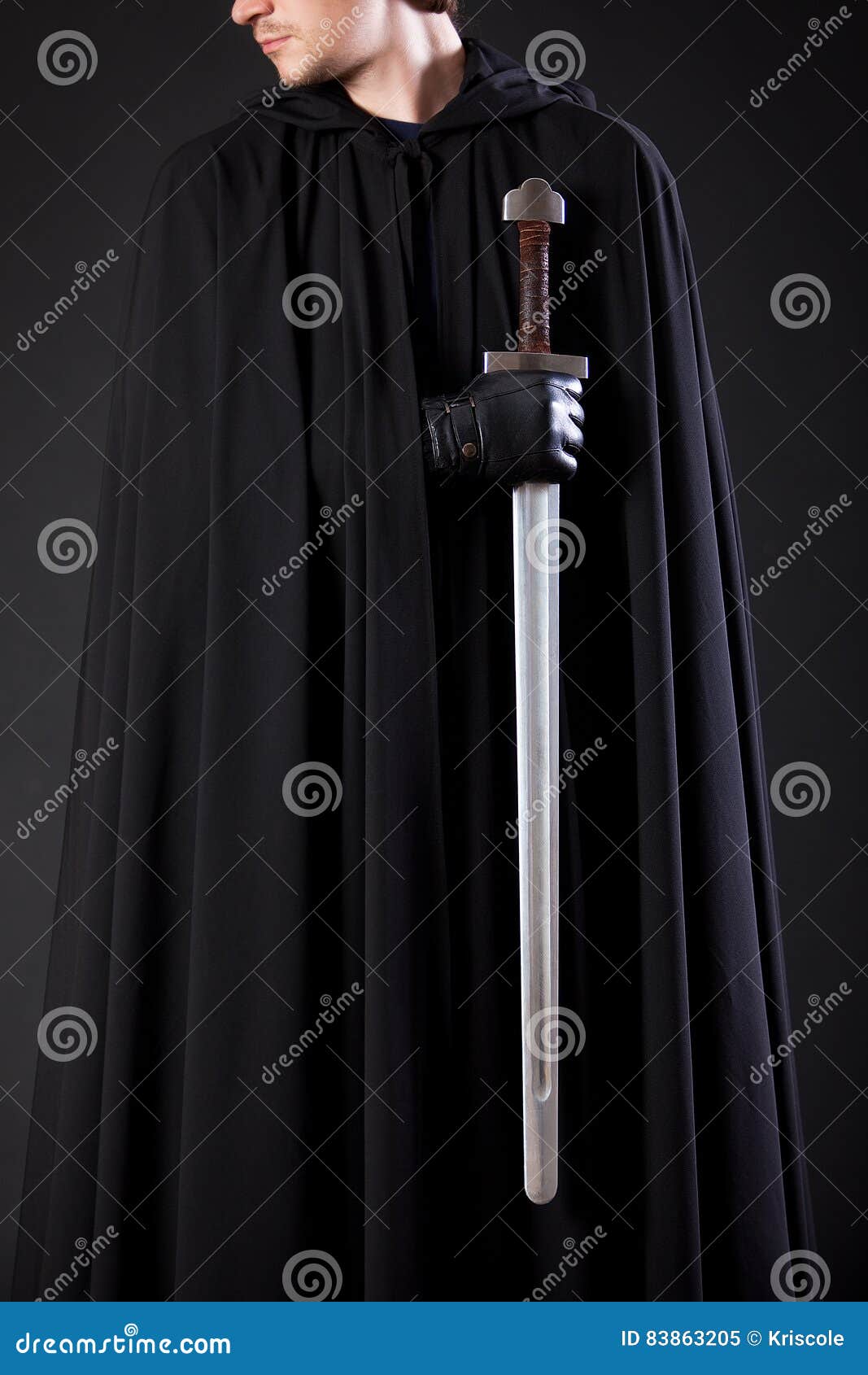 Portrait of a Courageous Warrior Wanderer in a Black Cloak and Sword in ...