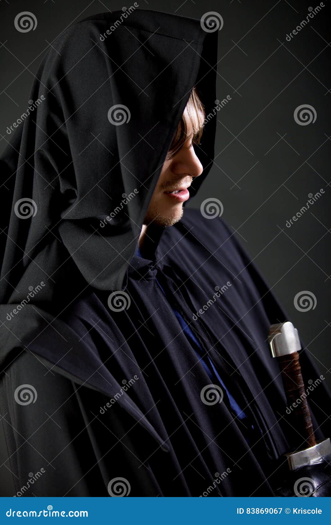 Portrait of a Courageous Warrior Wanderer in a Black Cloak and Sword in ...