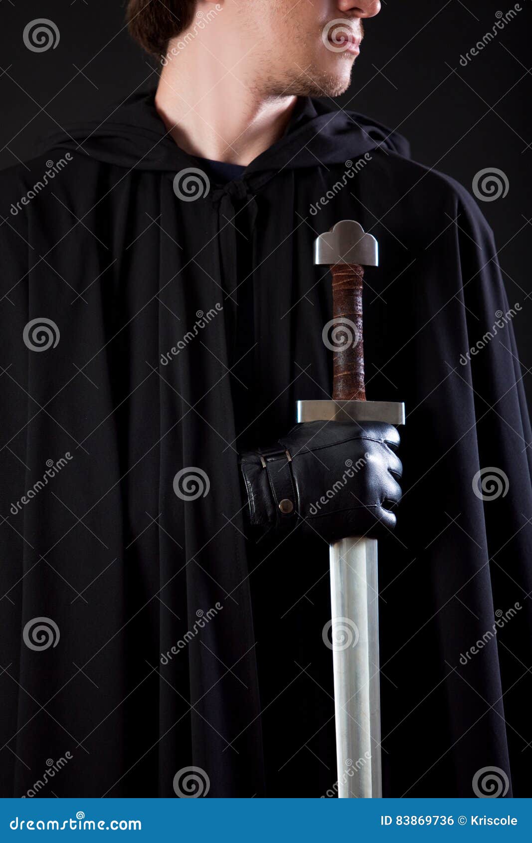 Portrait of a Courageous Warrior Wanderer in a Black Cloak and Sword in ...