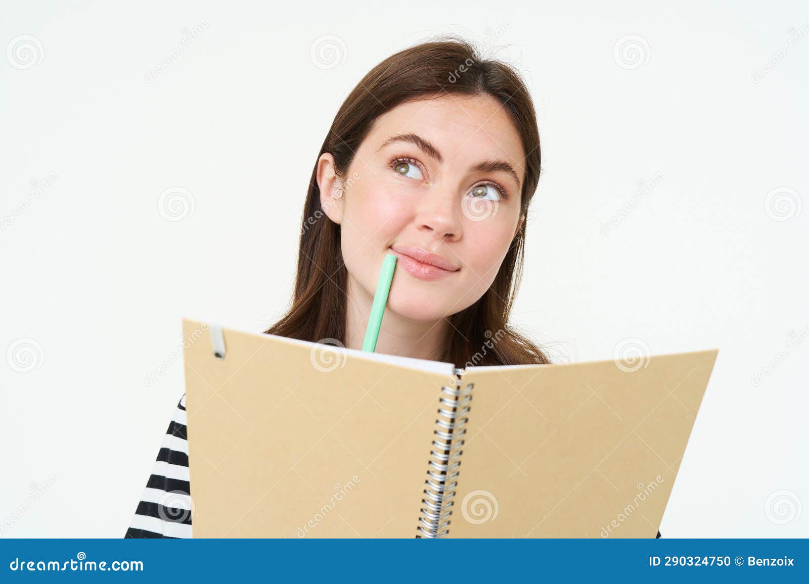Portrait of Creative Young Woman, Looking Thoughtful, Holding Pen and ...