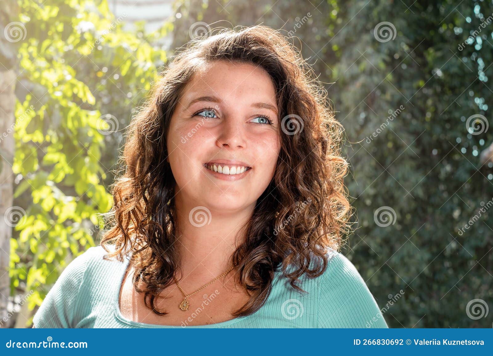 Portrait of curly woman stock photo. Image of outside - 266830692