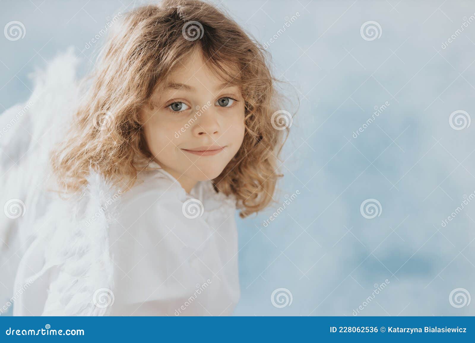 Portrait of cute angel stock photo. Image of redemption - 228062536