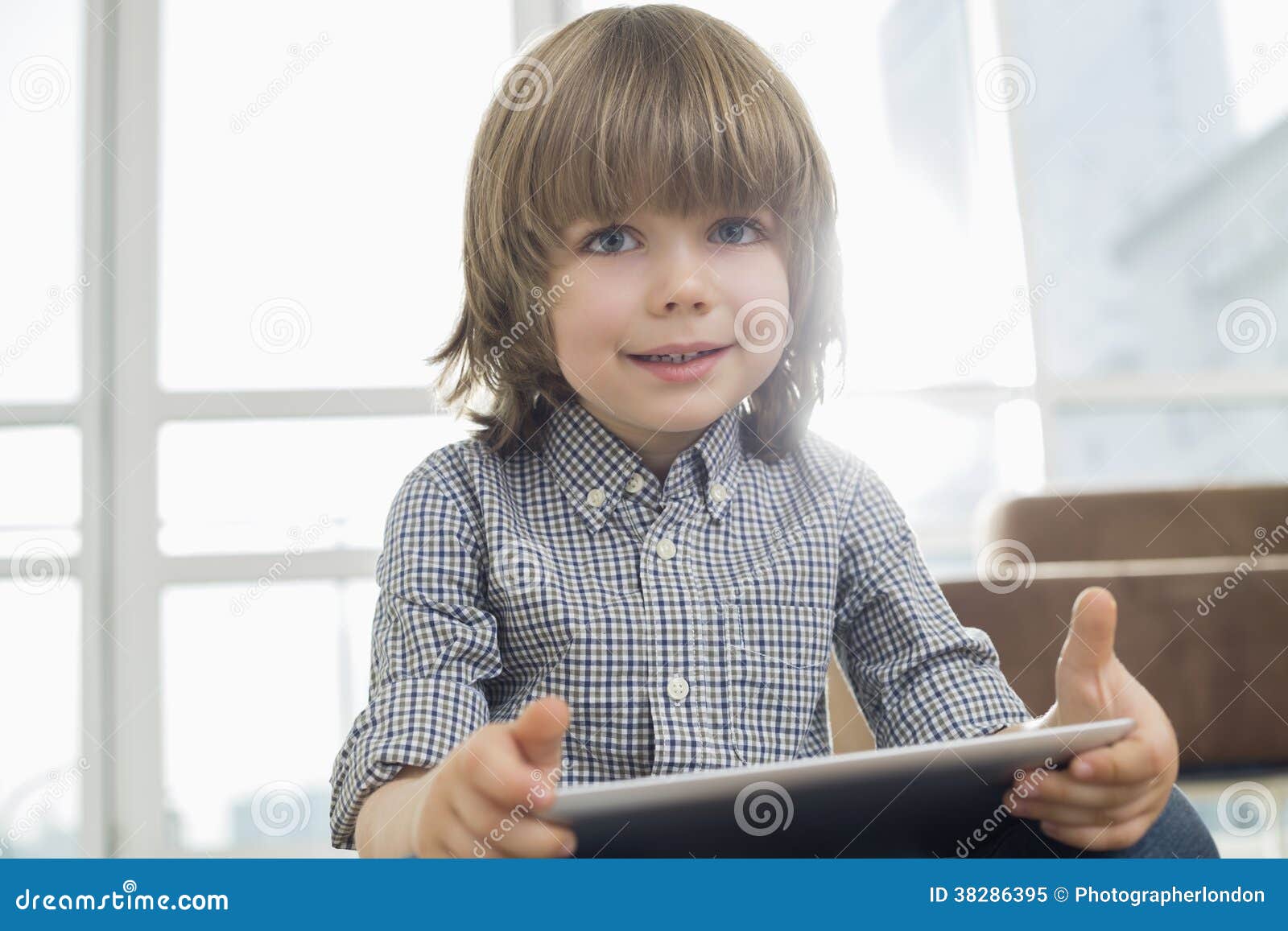 Portrait of Cute Boy Holding Tablet Computer at Home Stock Image ...