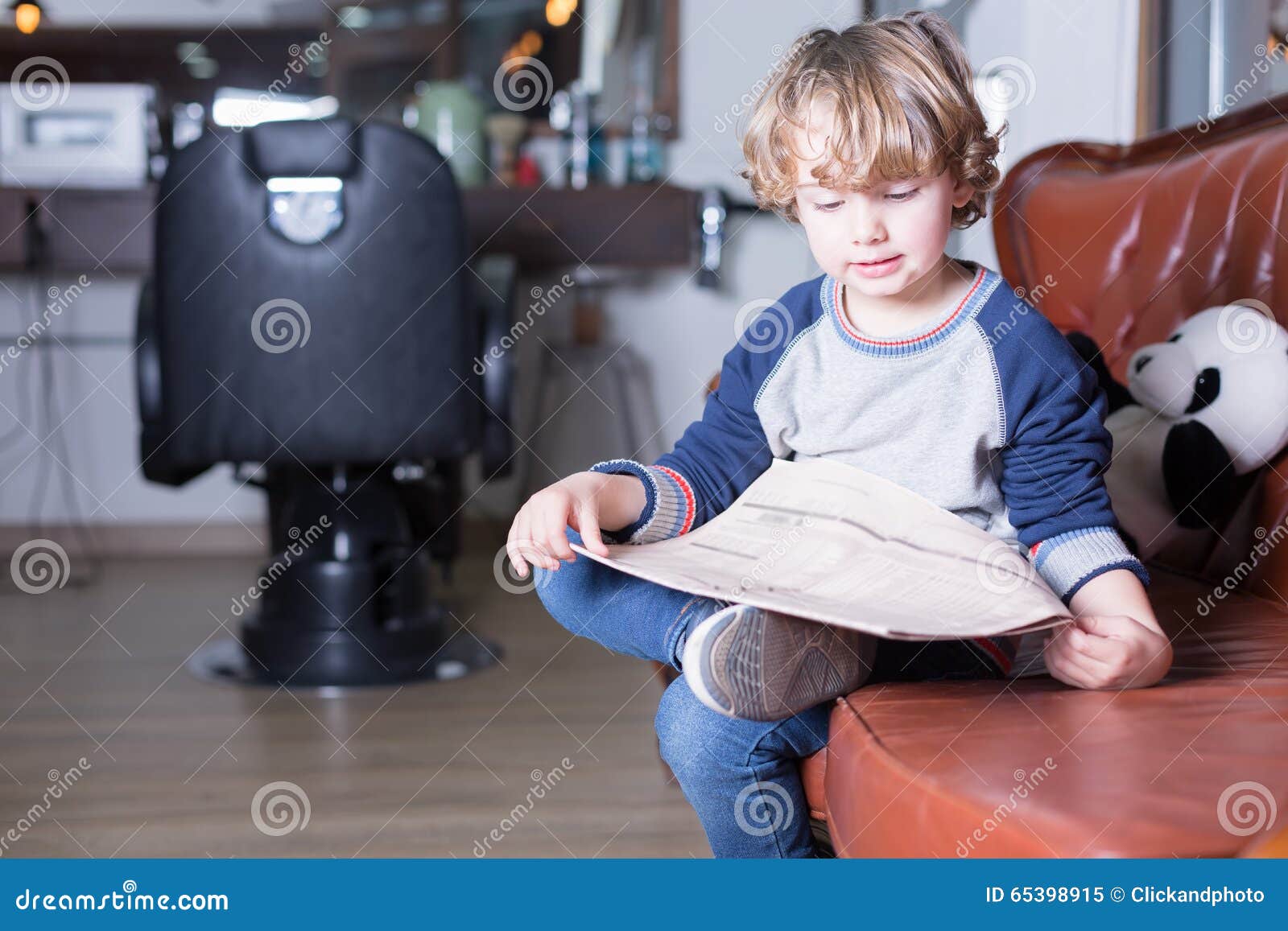 Portrait of Cute Boy Reading Newspaper Stock Image - Image of sofa ...