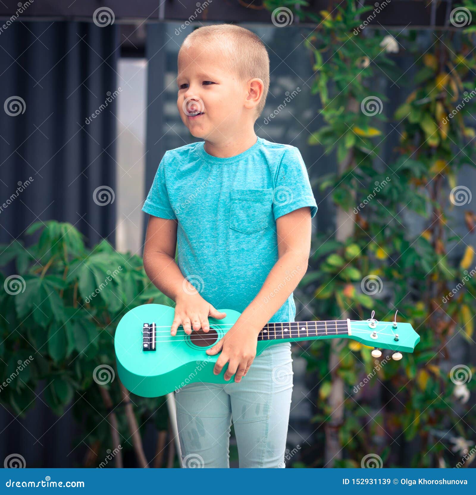 Portrait of a Cute Boy with Ukulele Stock Image - Image of artist ...