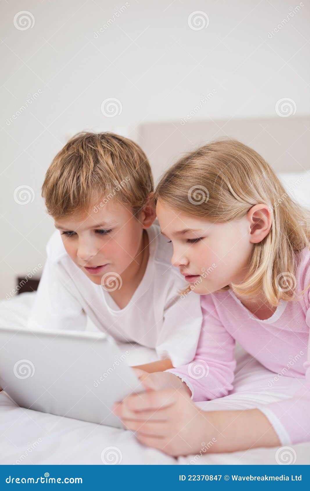 Portrait of Cute Children Using a Tablet Computer Stock Image - Image ...