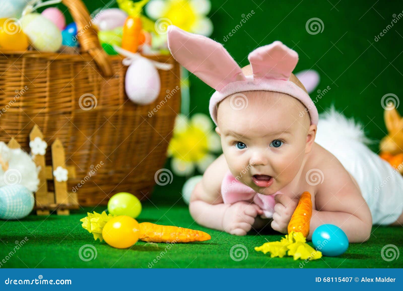 Portrait of a Cute Funny Baby Dressed in Easter Bunny Ears with Eggs ...