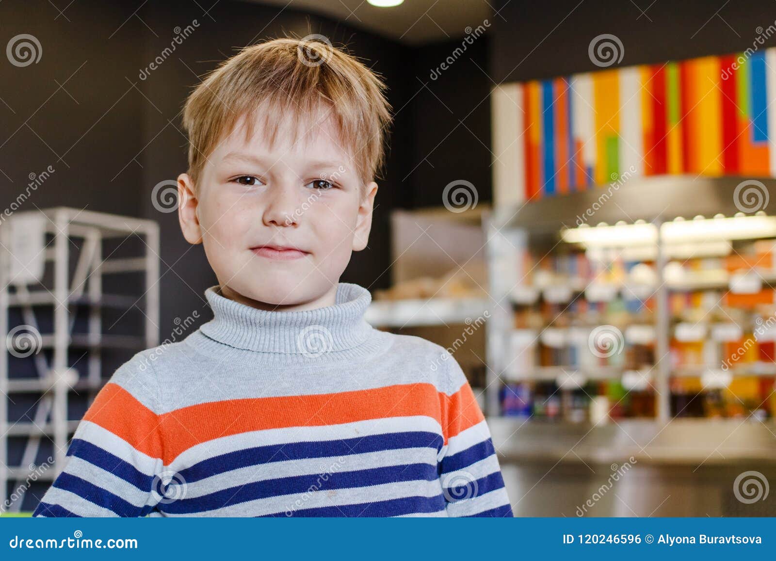 Portrait of Cute Little Boy in Cafe Looking at Camera Stock Photo ...