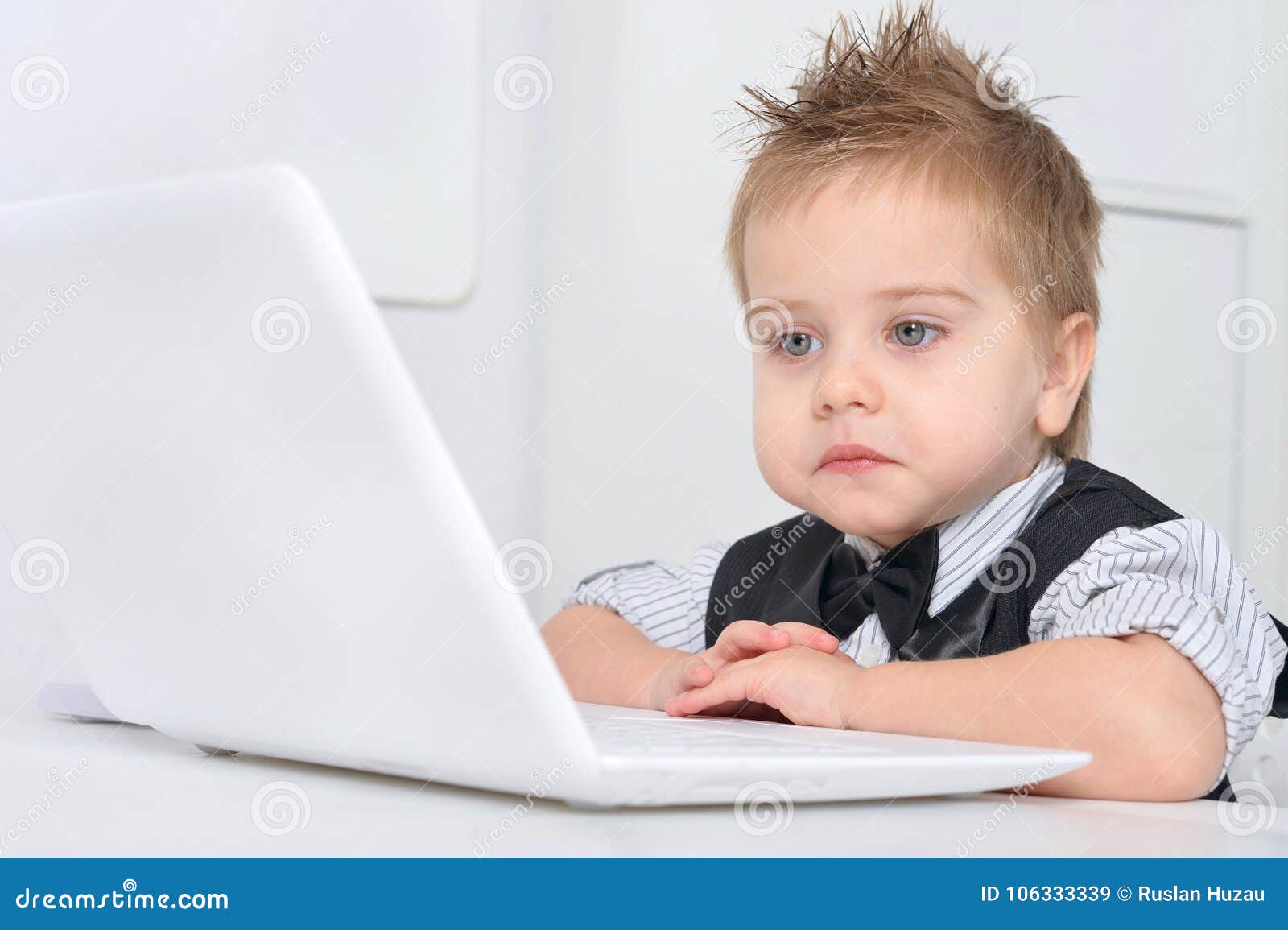 Little Boy with Computer Sitting Stock Image - Image of internet ...