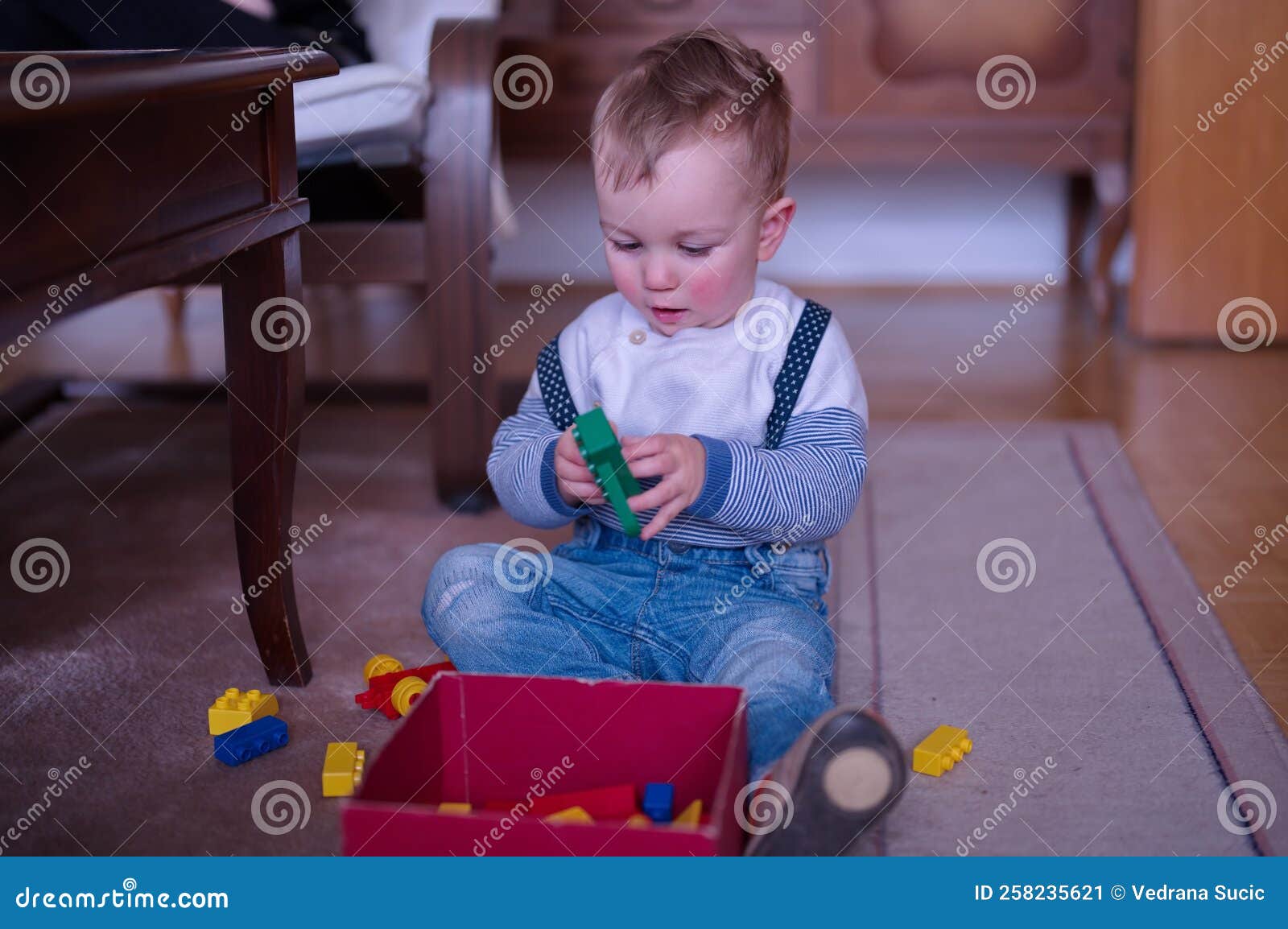 Cute Little Boy Playing on the Floor Stock Image - Image of light ...