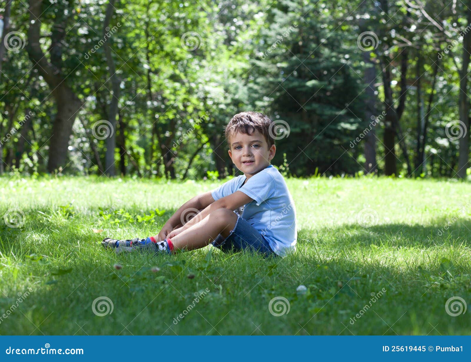 Portrait of Cute Little Boy Sitting on the Grass Stock Image - Image of ...