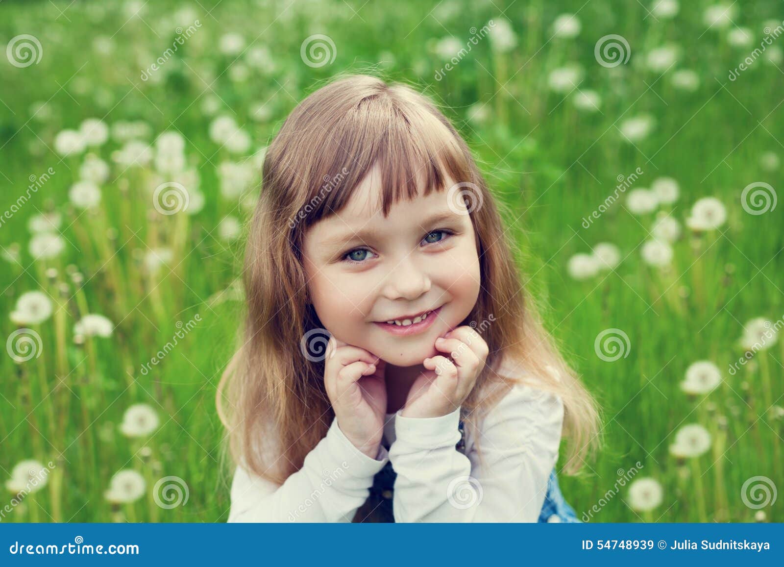 Portrait of Cute Little Girl with Beautiful Smile and Blue Eyes Sitting ... Portrait of Cute Little Girl with Beautiful Smile and Blue Eyes Sitting ...
