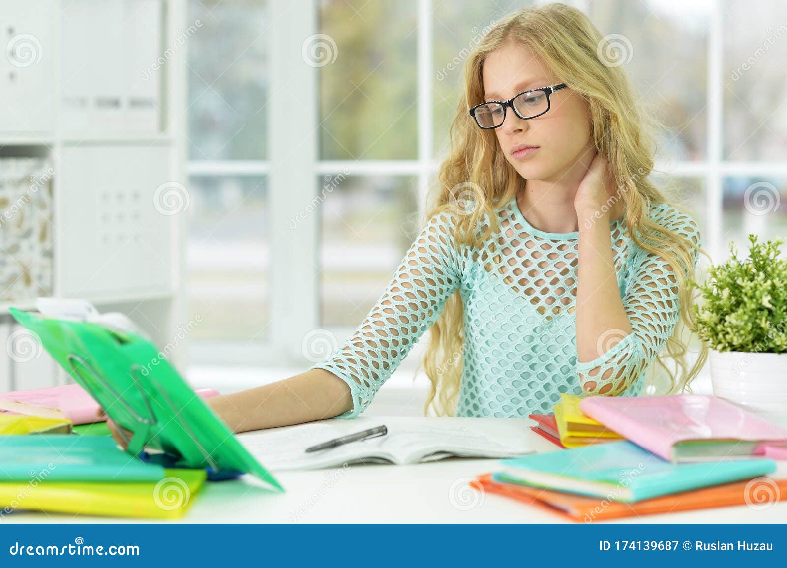Portrait of Cute Schoolgirl Doing Homework at Home Stock Image - Image ...