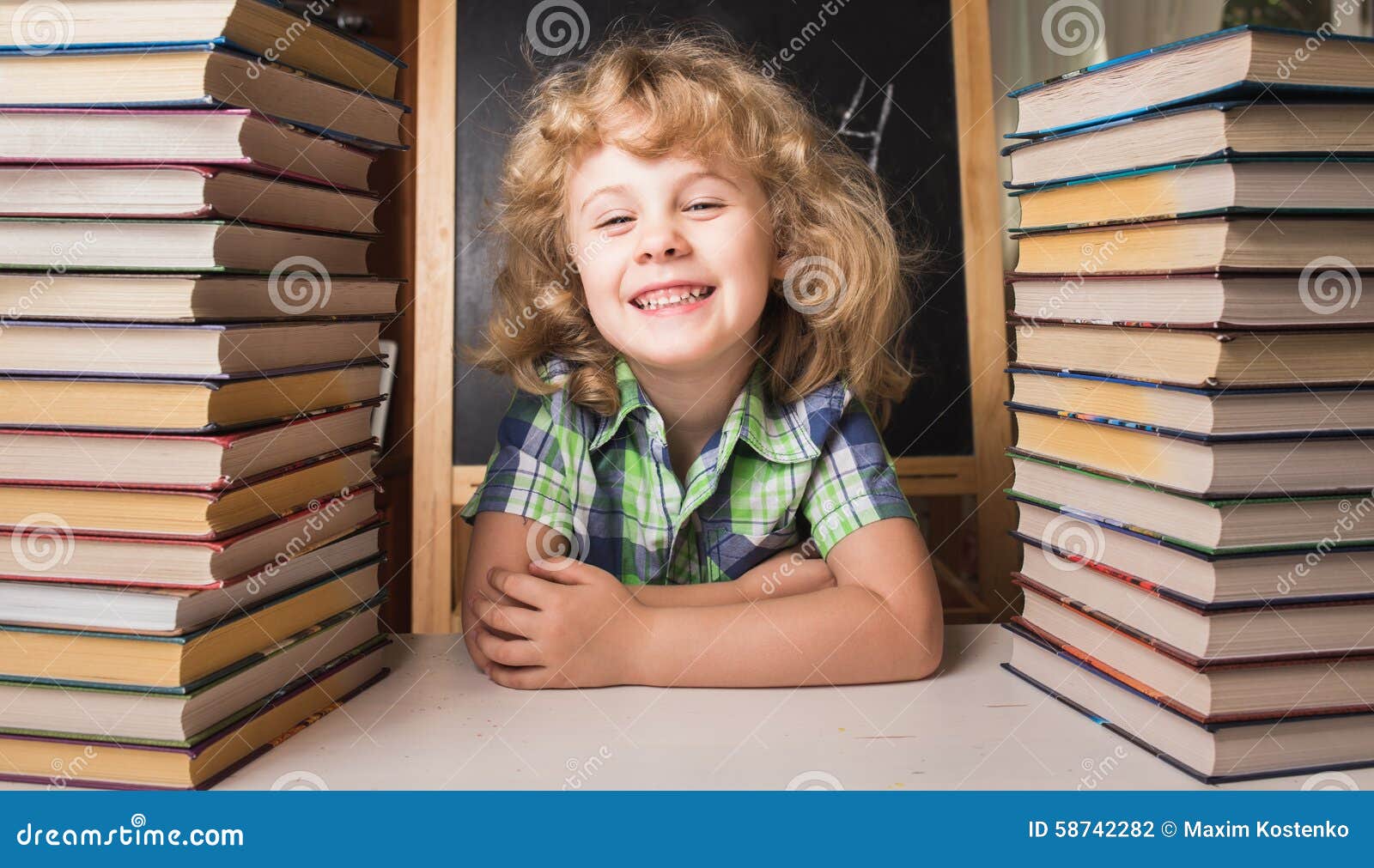 Portrait of Cute Smart Girl Smiling while Sitting Stock Photo - Image ...