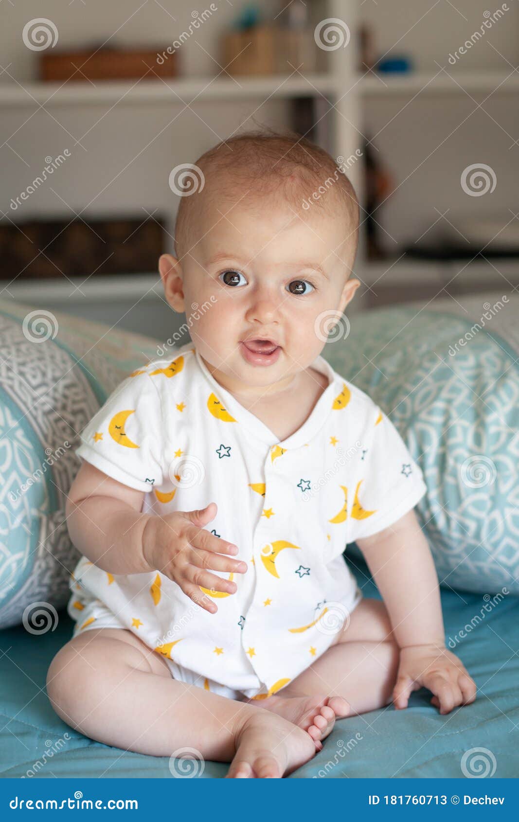 Portrait of a Cute Smiling Baby with Pajamas in Bedroom. Family Morning ... Portrait of a Cute Smiling Baby with Pajamas in Bedroom. Family Morning ...