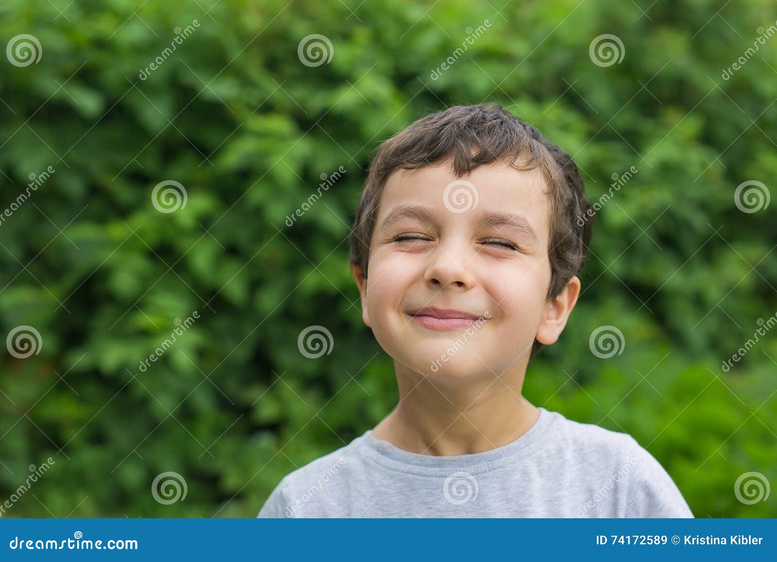 Portrait of a Cute Smiling Boy with a Closed Eyes Stock Image - Image ...