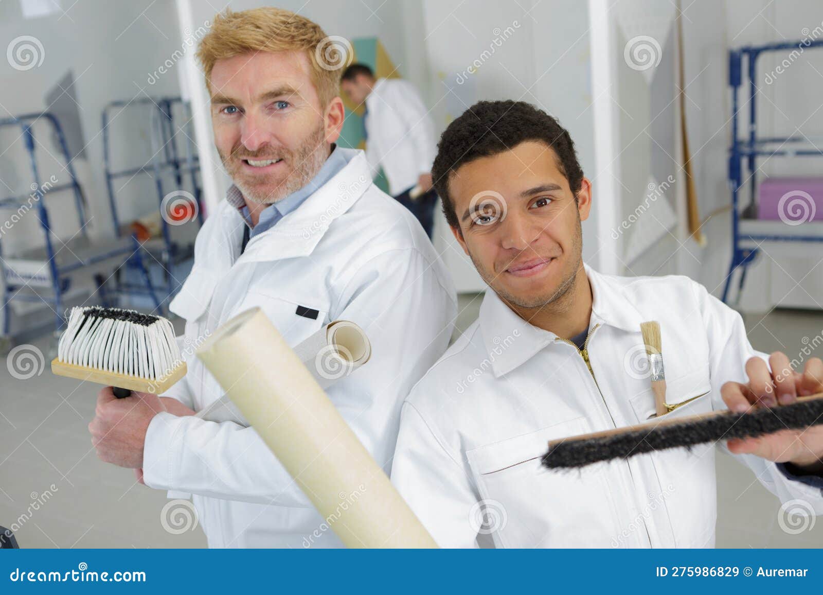 Portrait Decorating Team Holding Brushes Stock Image - Image of white ...