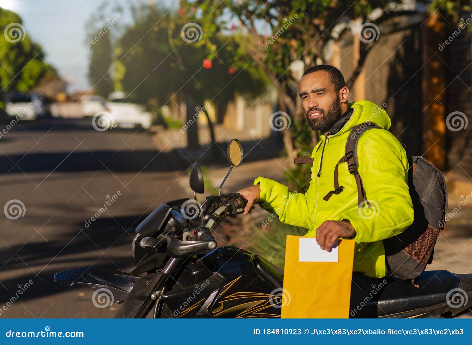 Portrait of Delivery Man with Parcel in Envelope. Document Delivery ...