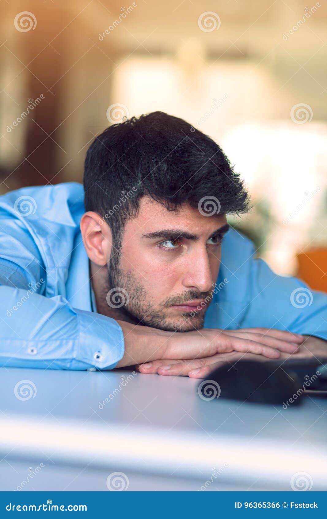 Portrait of a Depressed Office Worker Laying on His Desk and Thinking ...