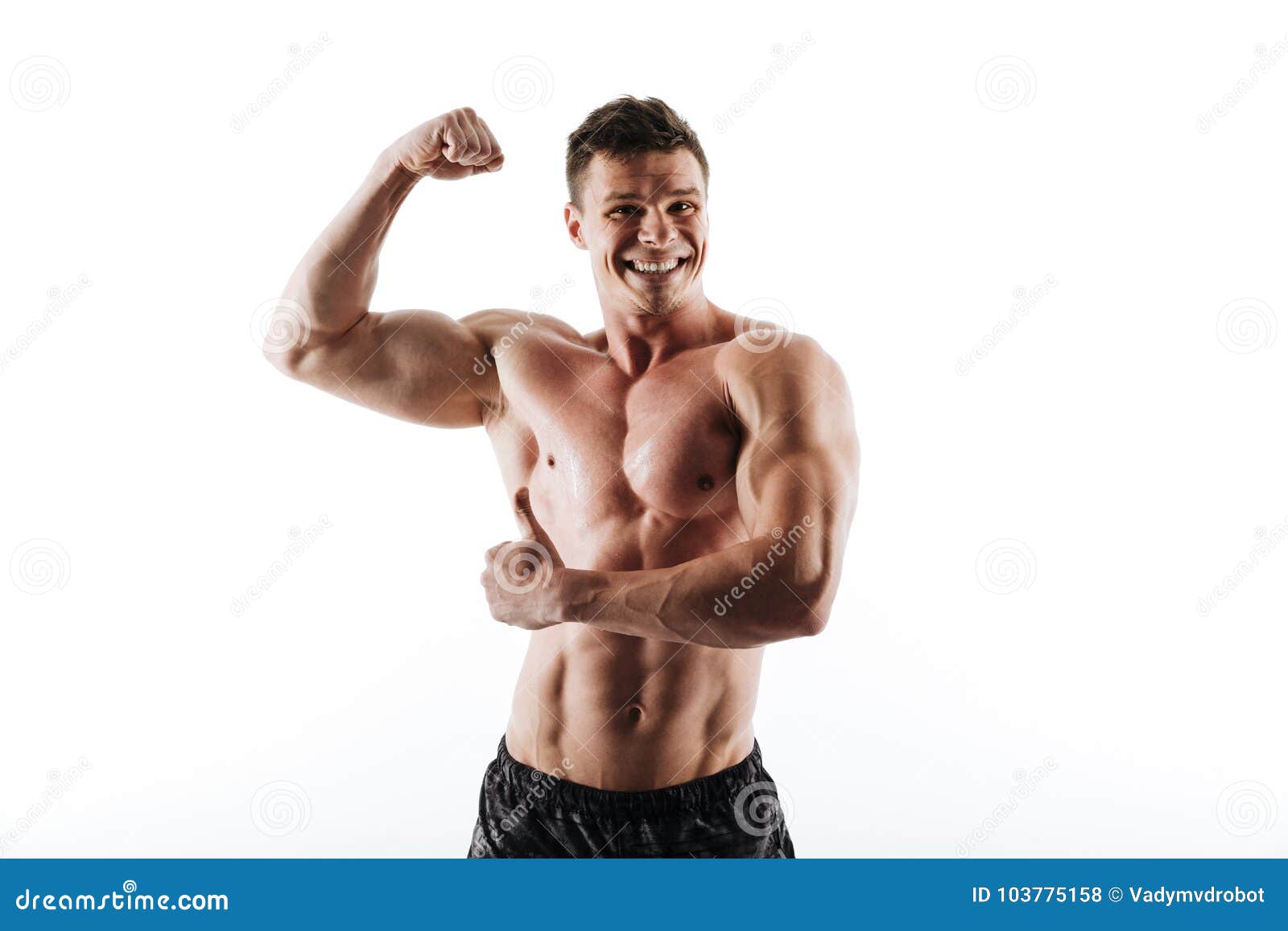 Portrait Des Jeunes Riant Lhomme Musculaire Montrant Son Biceps Et T