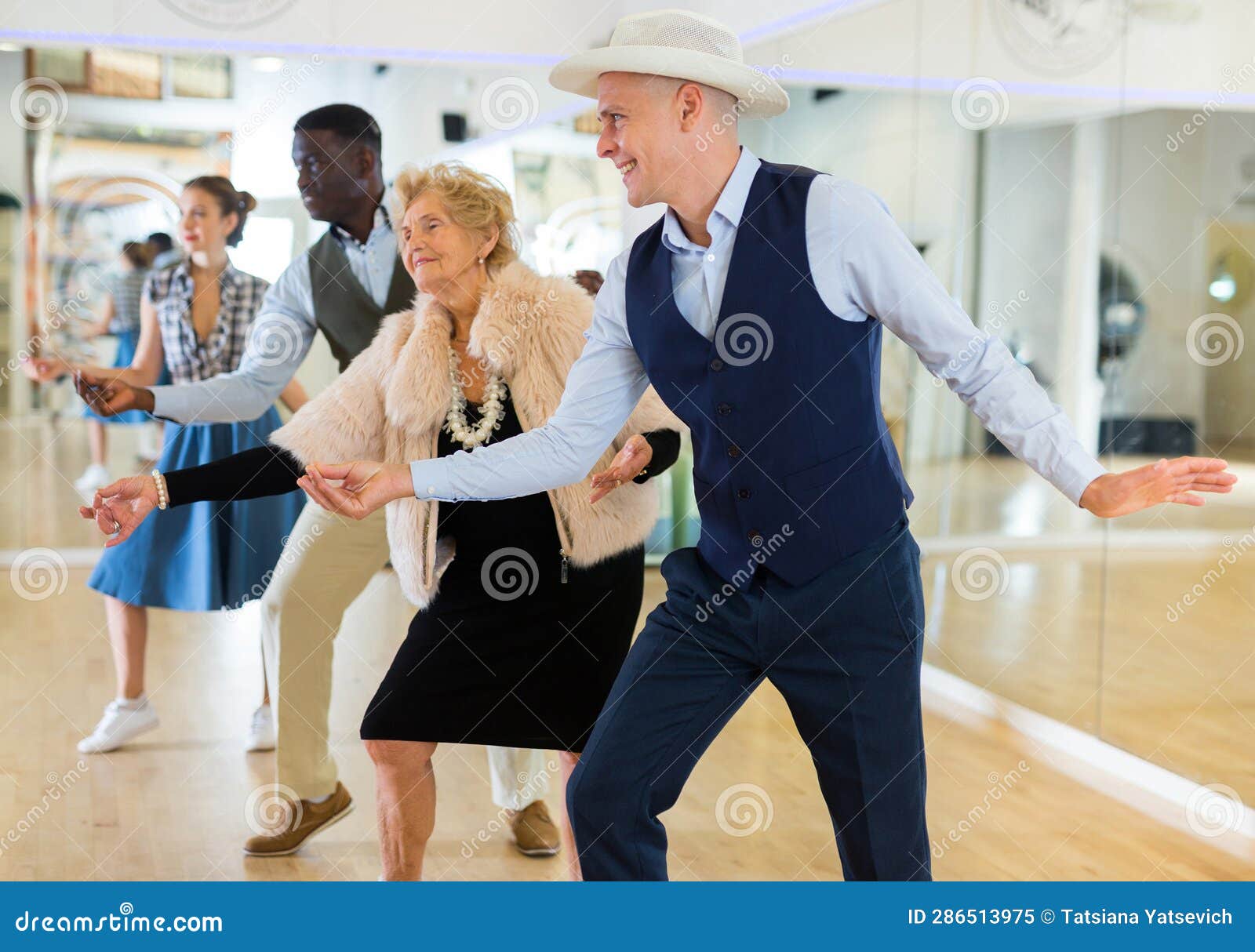 Group of Different Age Dancers Preparing Swing Performance Stock Image ...